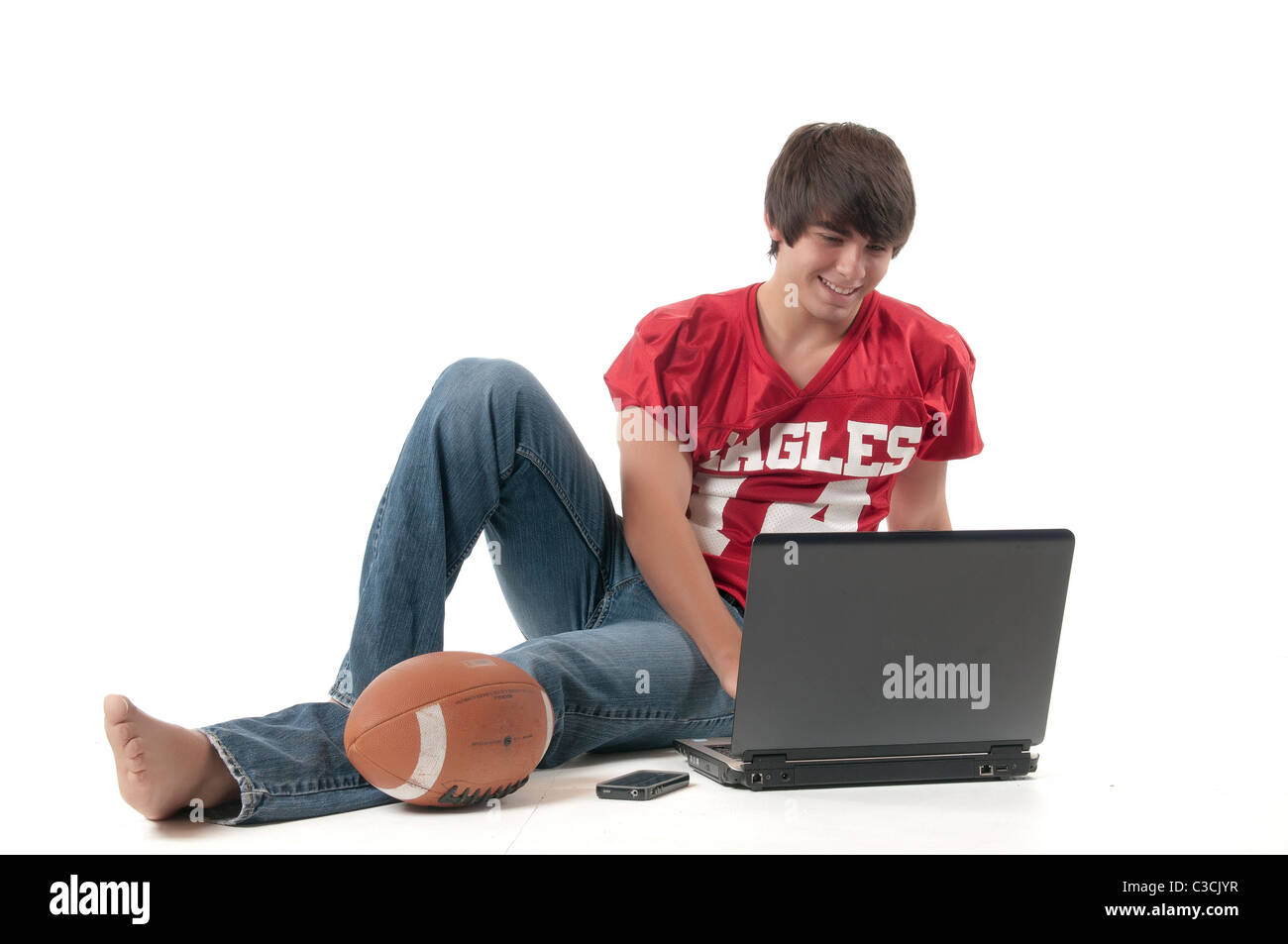 Boy football shirt teenager Cut Out Stock Images & Pictures - Alamy