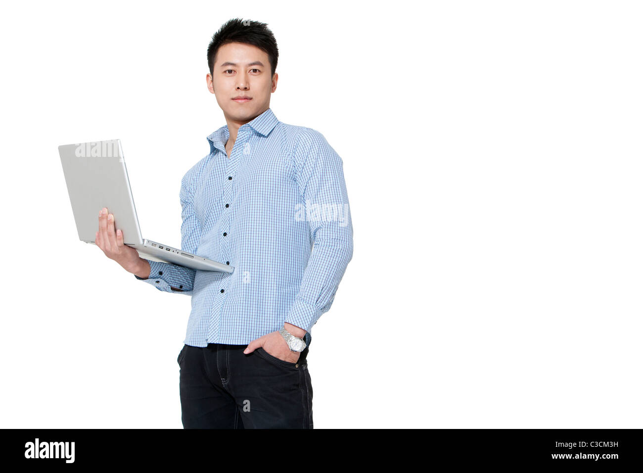 Smiling man using laptop in Cut Out Stock Images & Pictures - Alamy