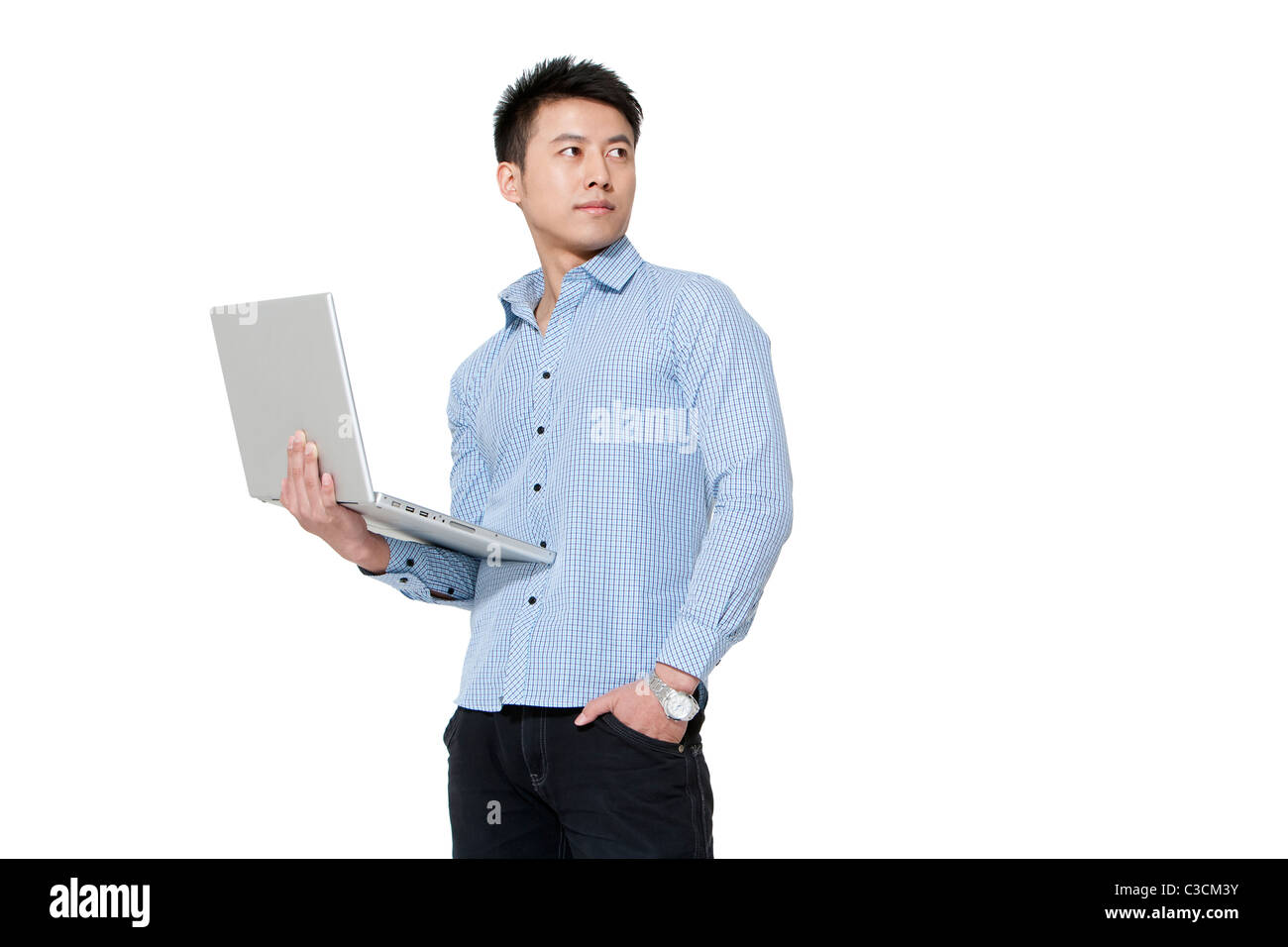 Man holding a laptop Stock Photo - Alamy