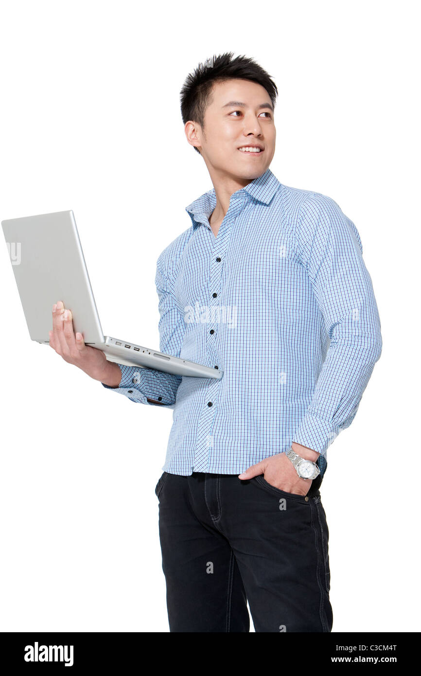 Man holding a laptop Stock Photo - Alamy