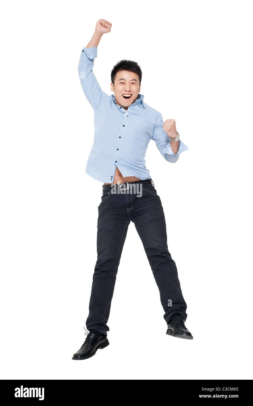 An excited young man Stock Photo - Alamy