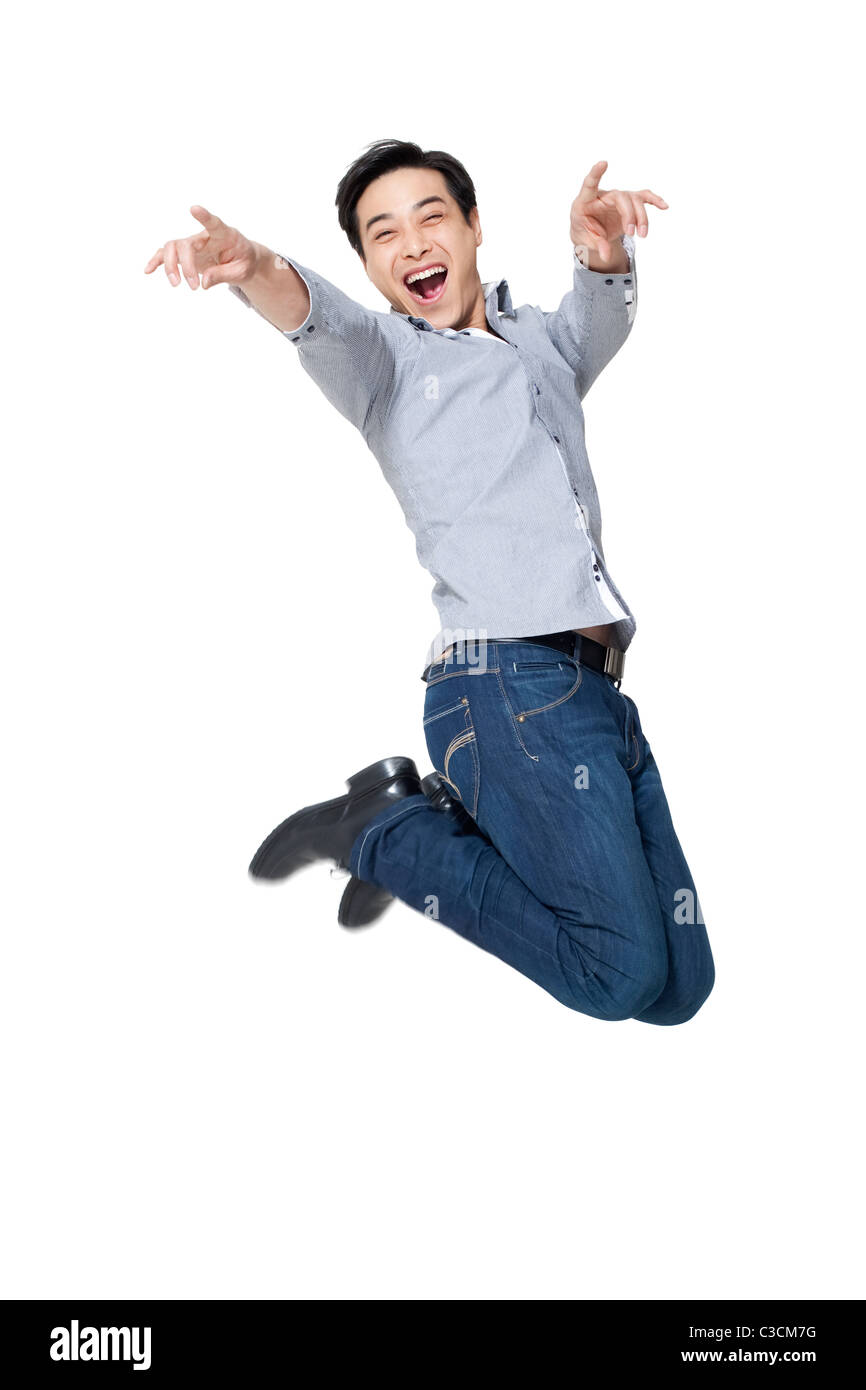 An excited young man Stock Photo - Alamy
