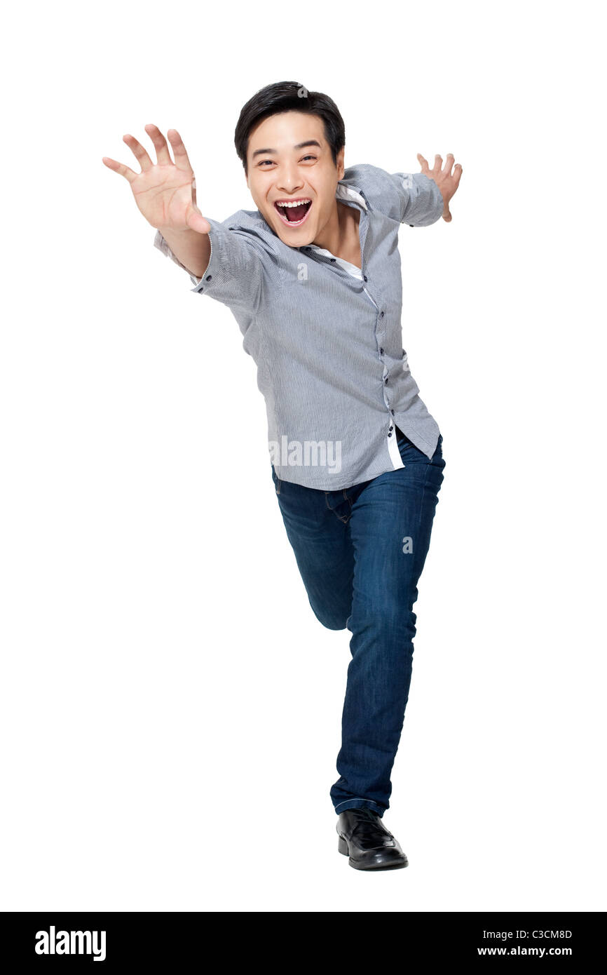 An excited young man Stock Photo - Alamy