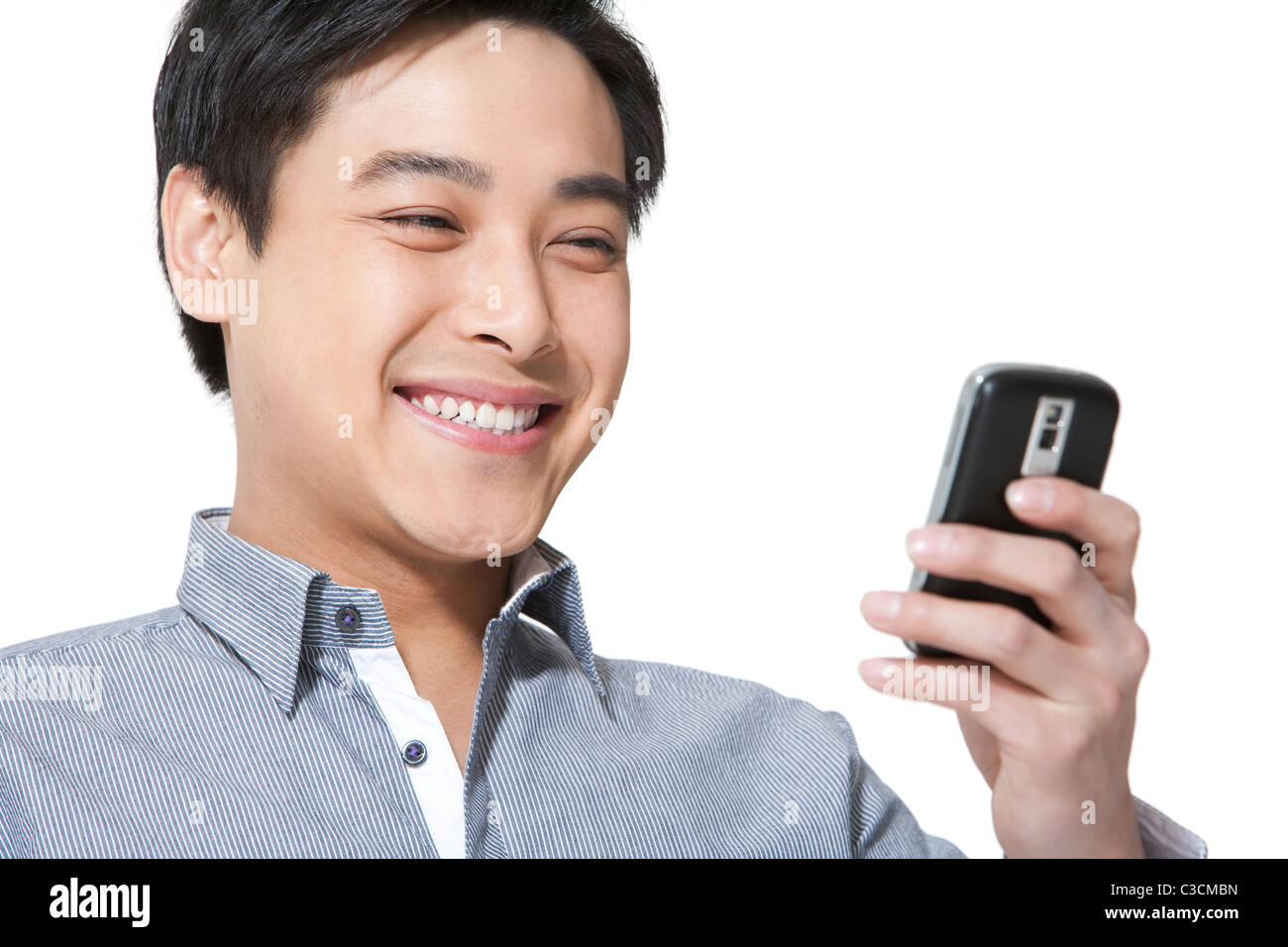 Portrait of a man using his mobile phone Stock Photo - Alamy