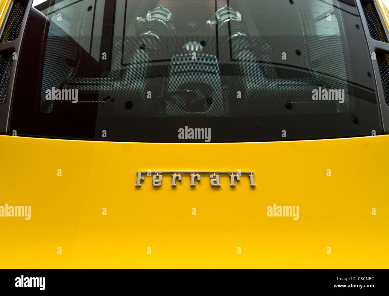 Rear window of yellow Ferrari F430, Orchard Rd, Singapore Stock Photo ...