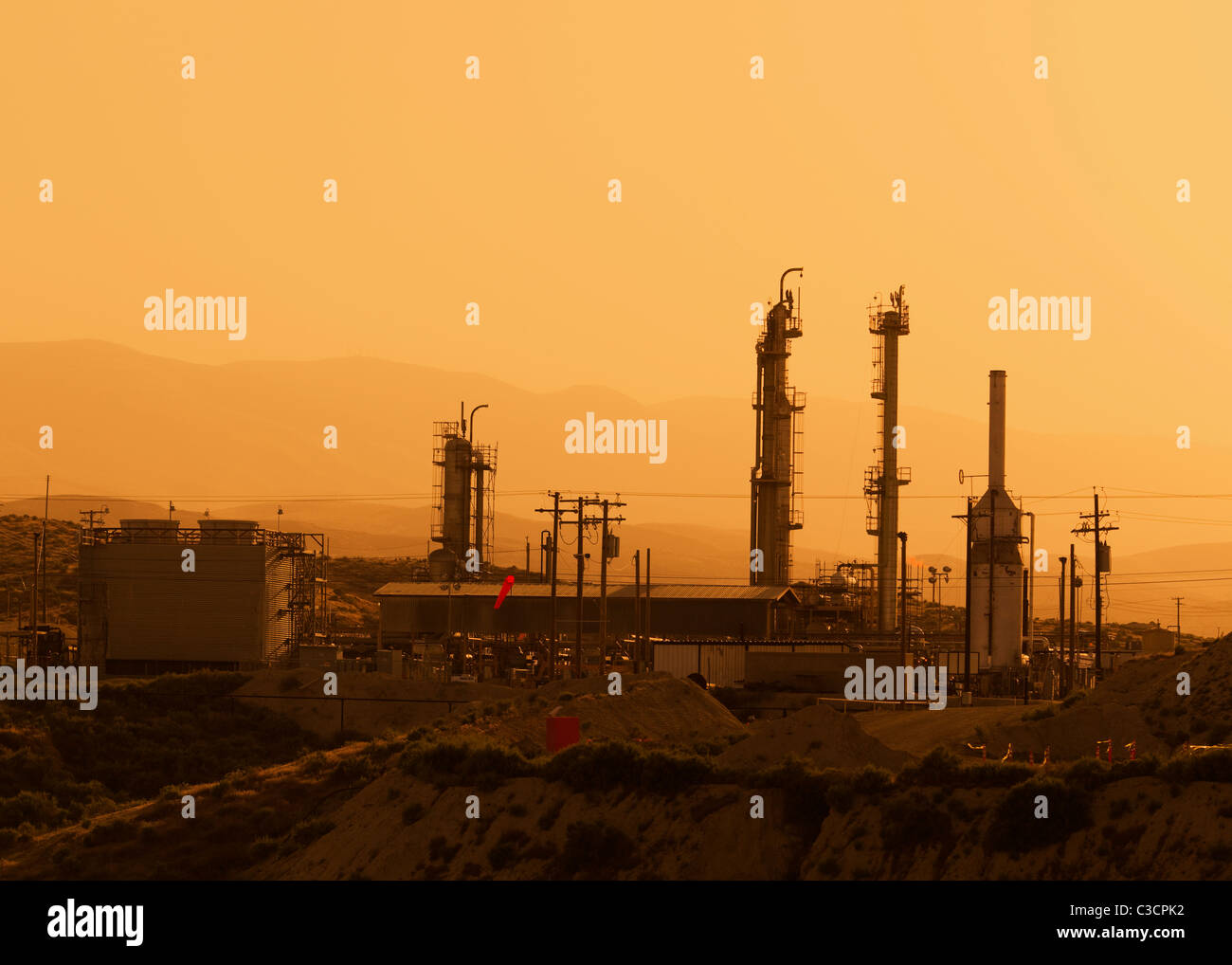 California oil refinery under amber sky - Kern River Oil Field ...