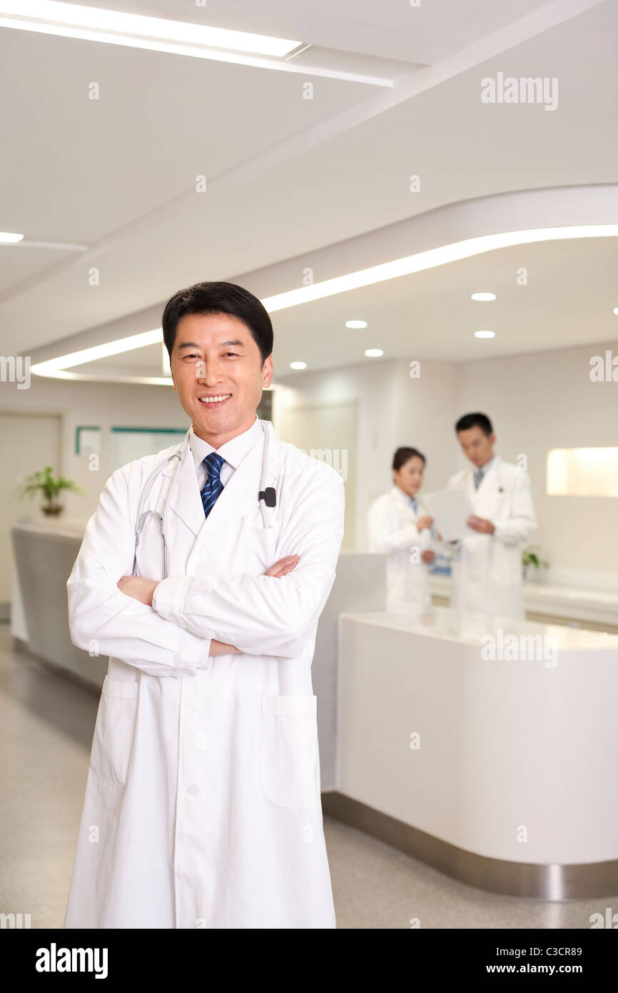 Portrait of a cheerful doctor Stock Photo - Alamy