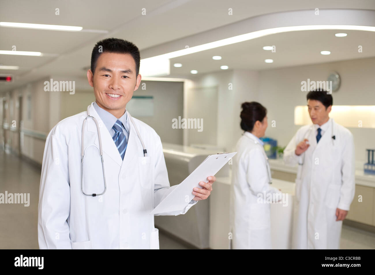 Portrait of a confident doctor Stock Photo - Alamy