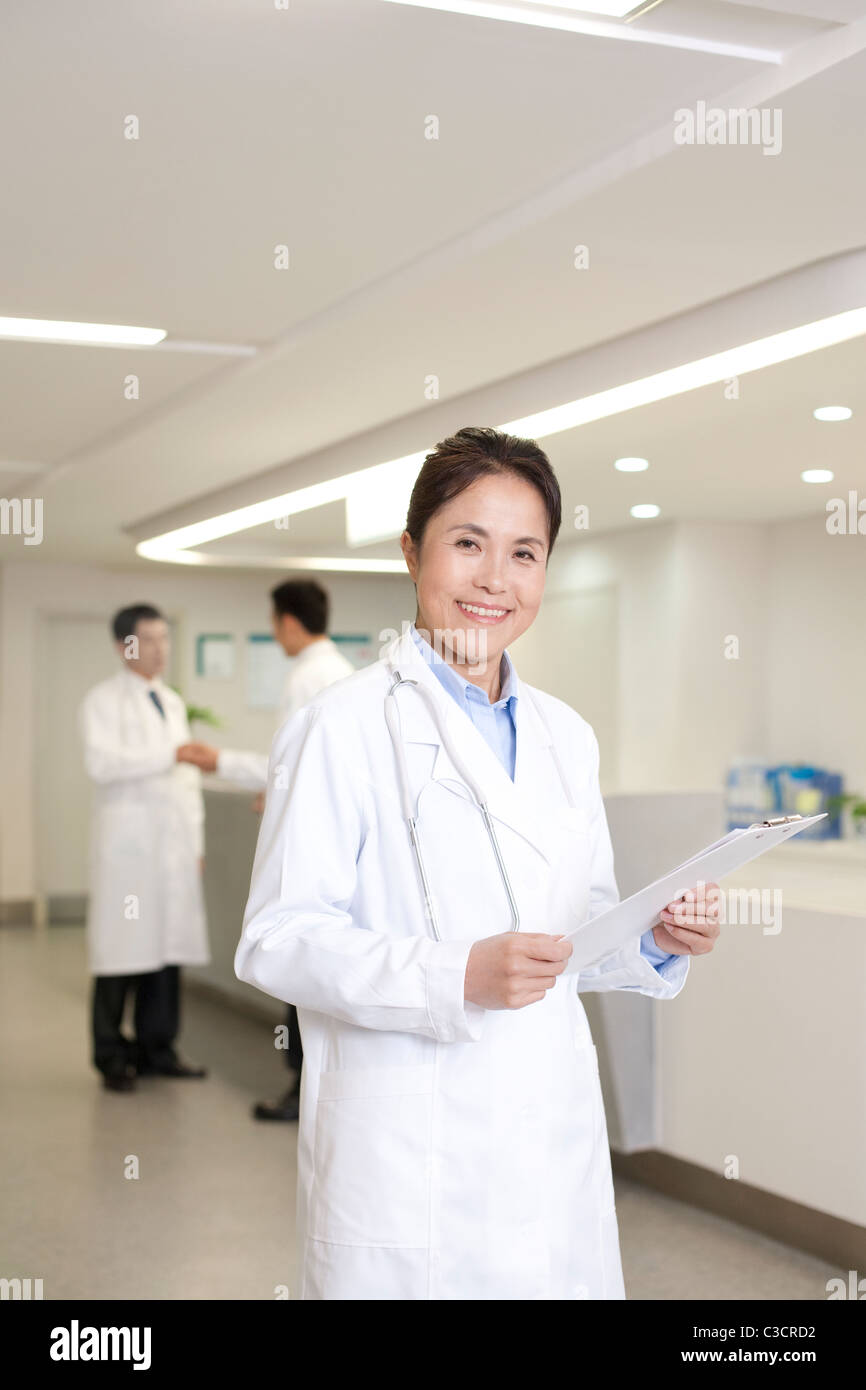 Portrait of a confident female doctor Stock Photo - Alamy