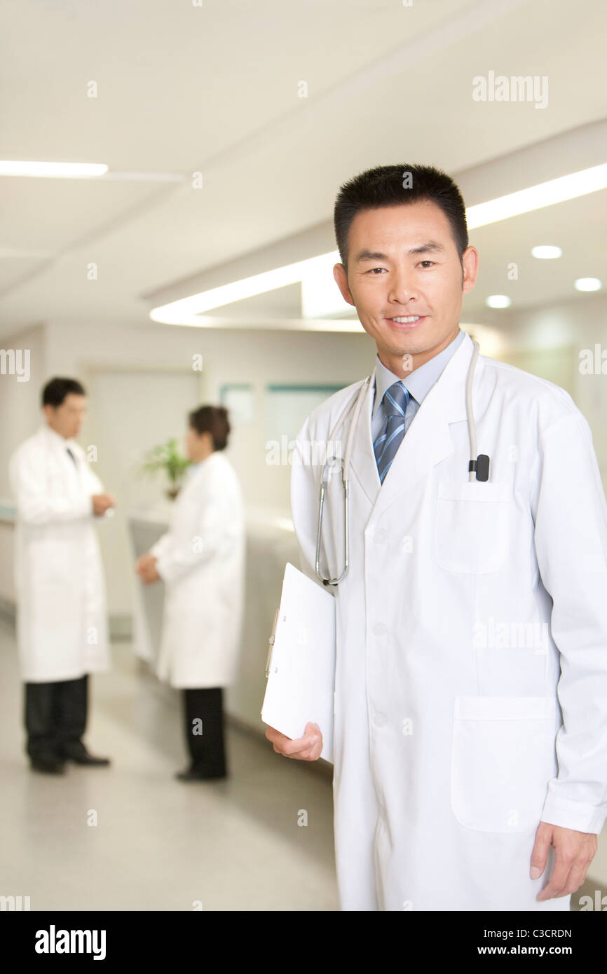 Portrait of a confident doctor Stock Photo - Alamy