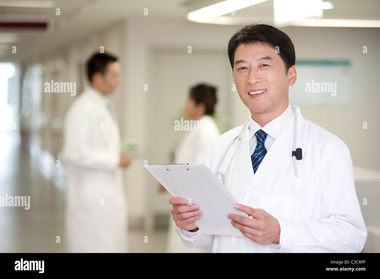 Portrait of a confident doctor Stock Photo - Alamy