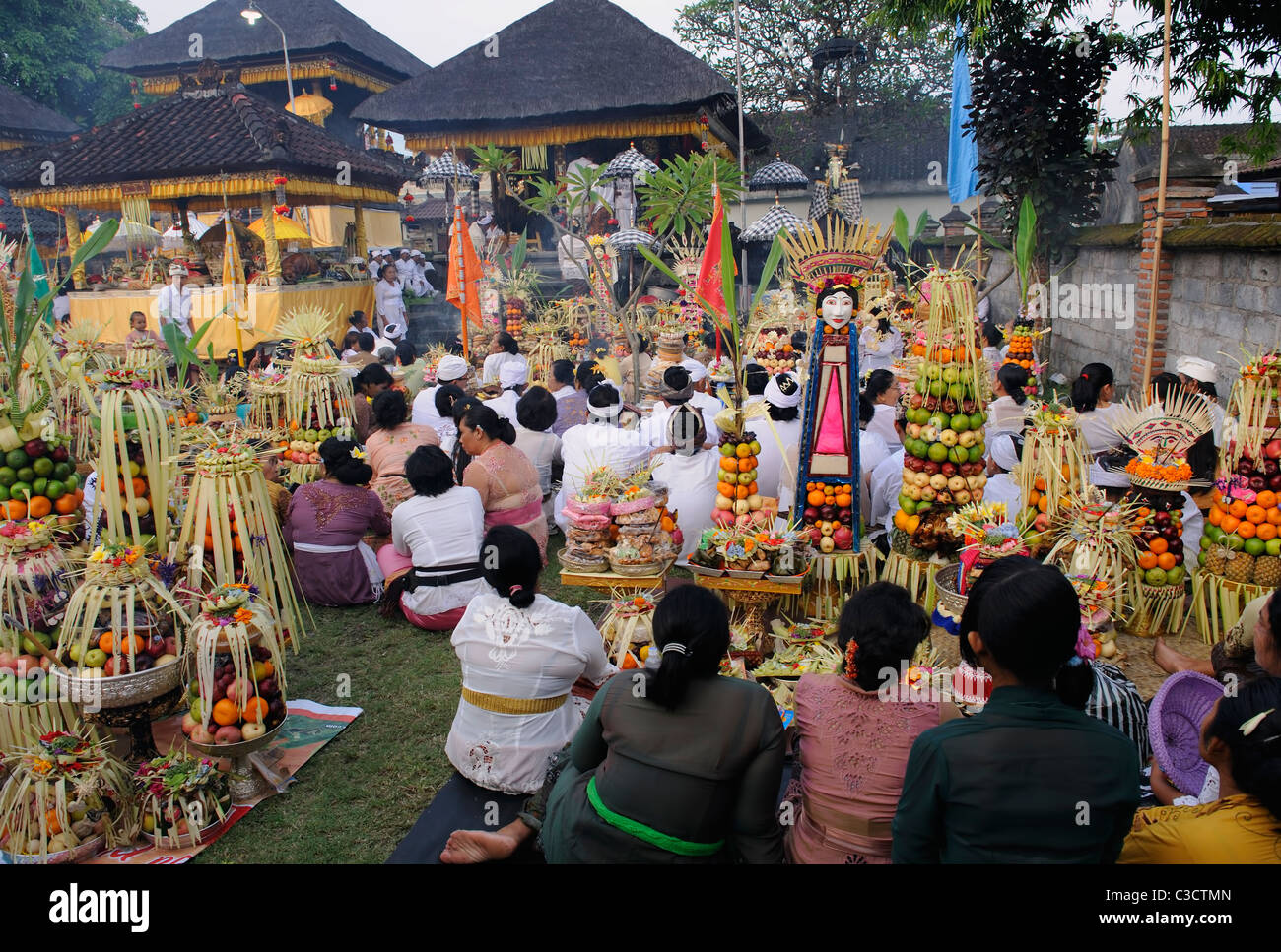 colorful fruit offerings waiting to be blessed at a bali religious ...