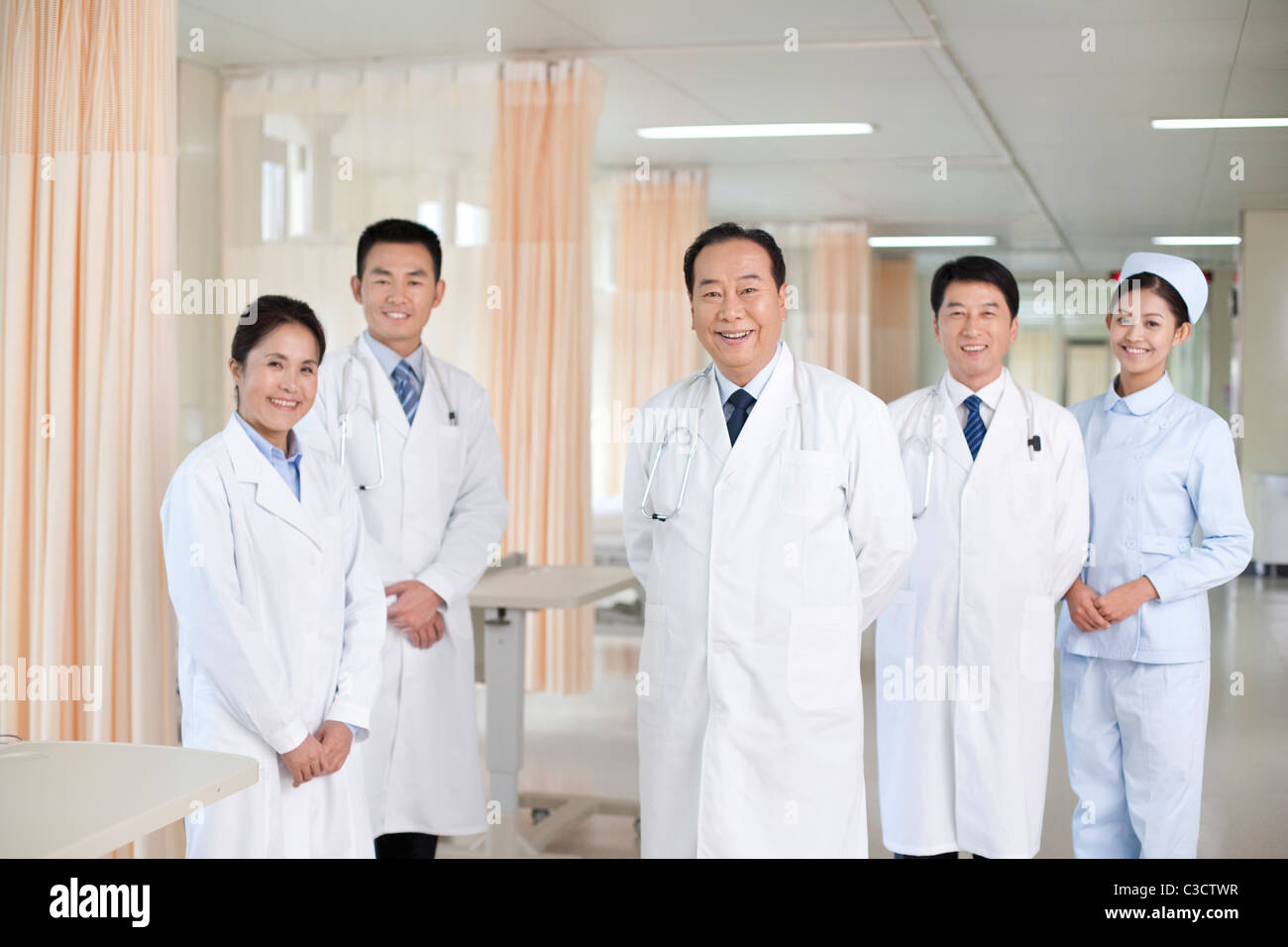 Medical staff smiling in hospital ward Stock Photo - Alamy