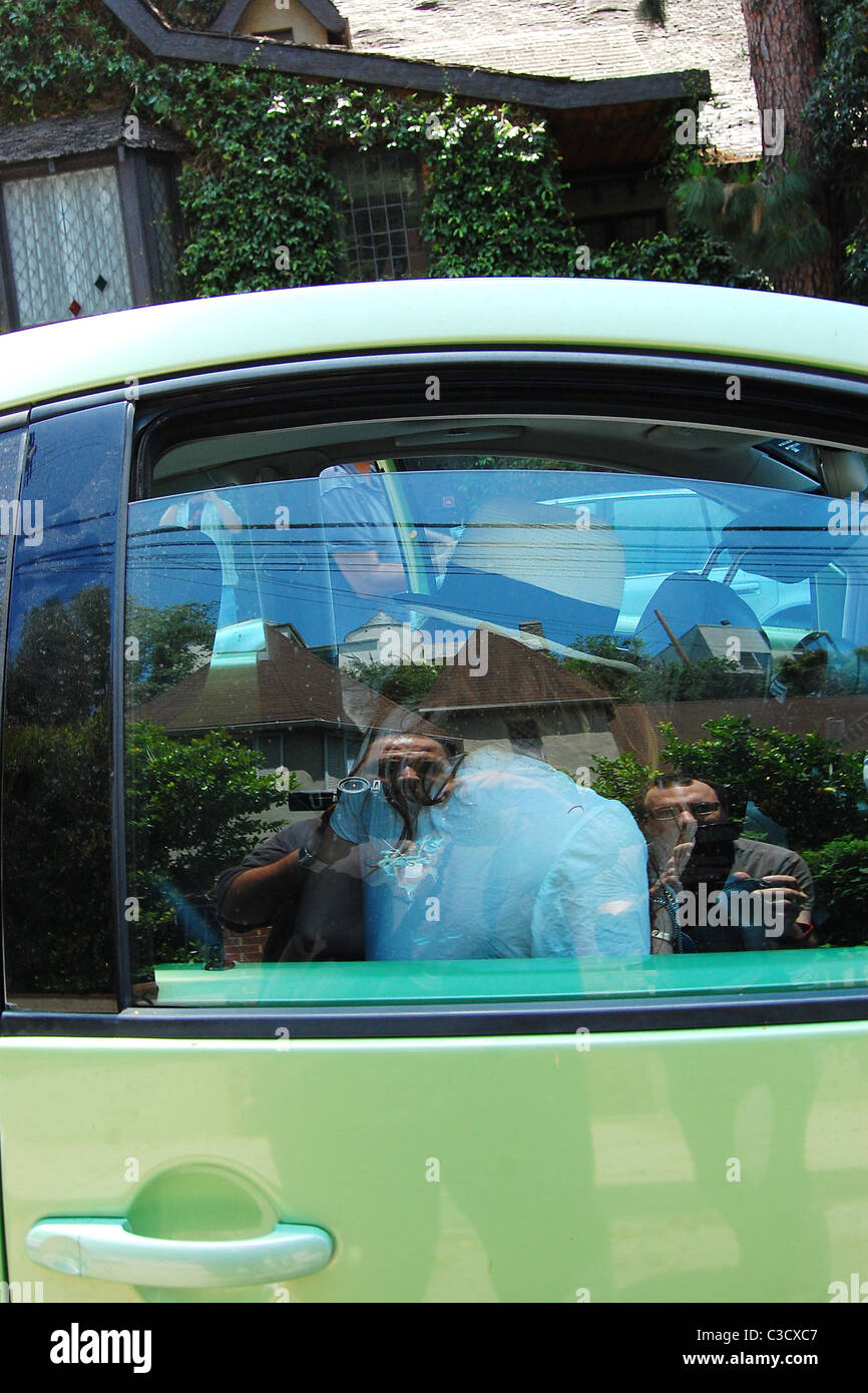 Lindsay Lohan leaving Samantha Ronson's residence in a green Volkswagen ...