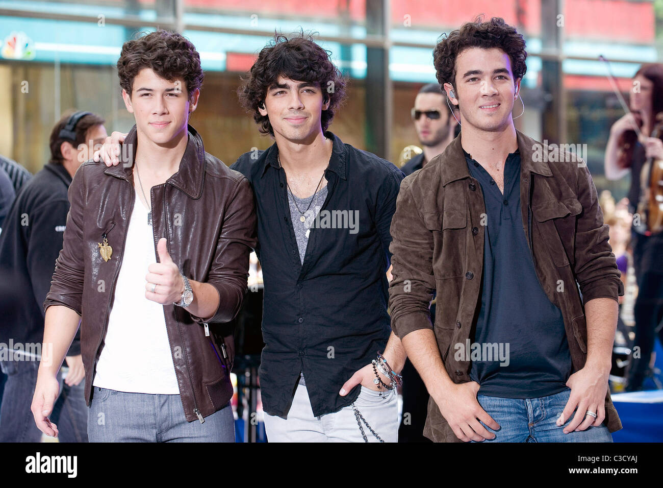 Nick Jonas, Joe Jonas and Kevin Jonas The Jonas Brothers perform live ...