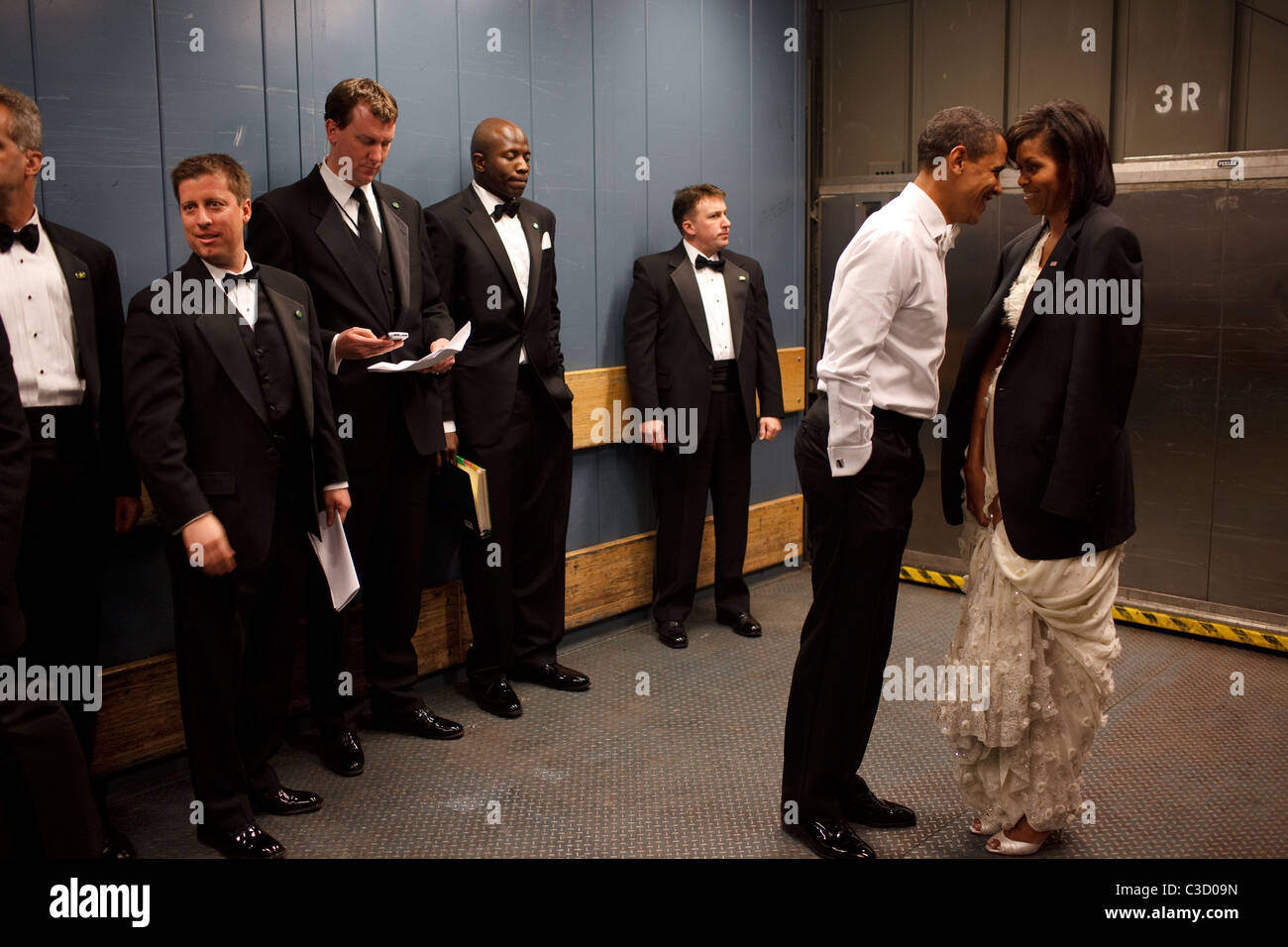 US President Barack Obama and First Lady Michelle Obama share a private ...