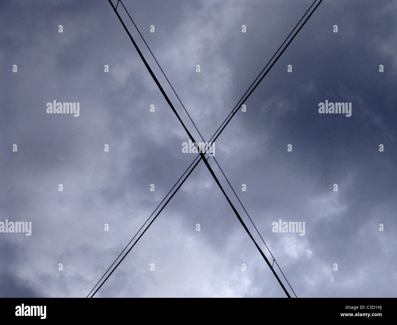 Cross cables in Sky Stock Photo - Alamy