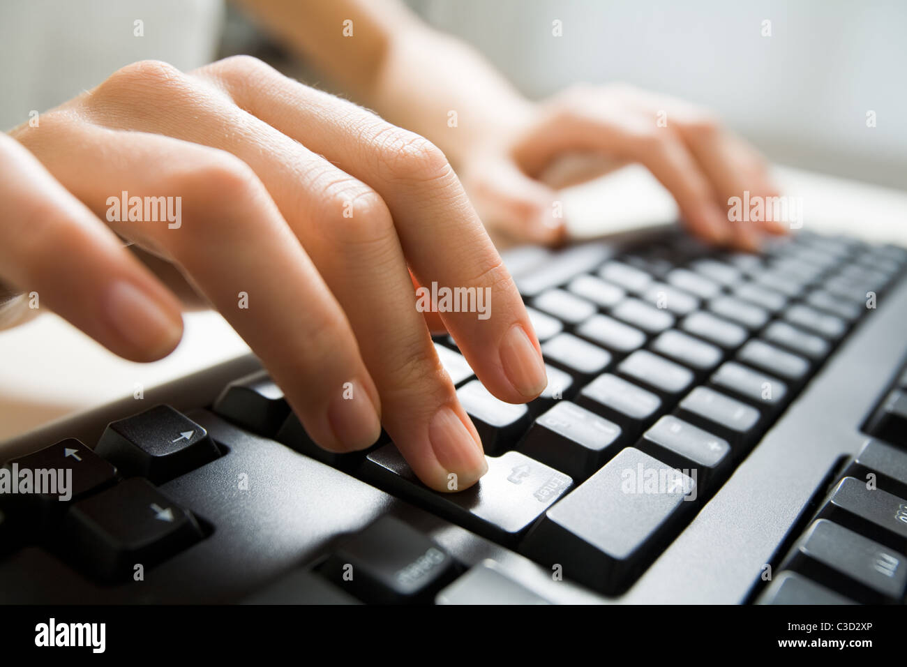 Image of female fingers pushing enter key during computer work Stock ...