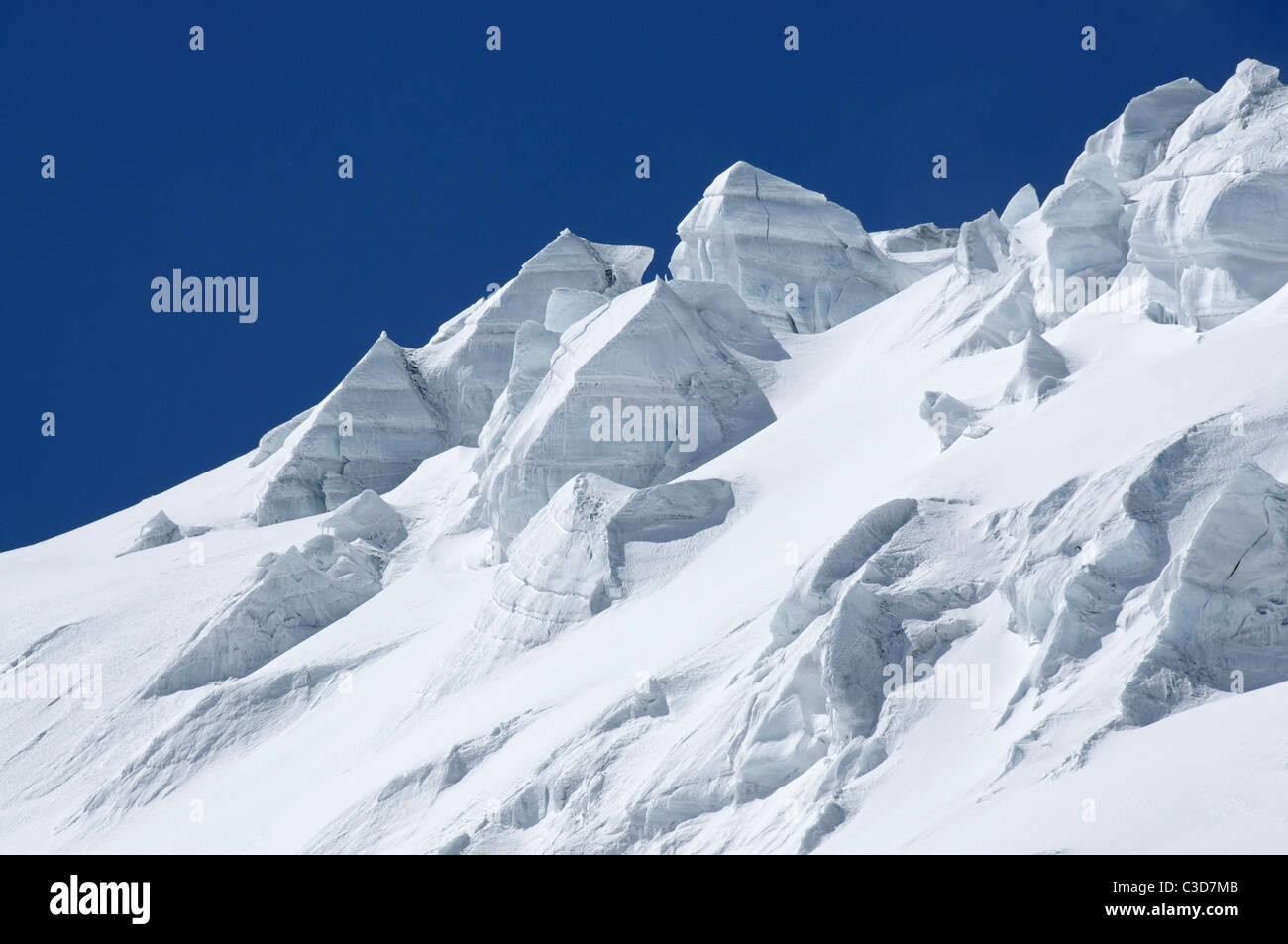 Ice cliffs, seracs and ice towers on a glacier in the Swiss Alps Stock ...