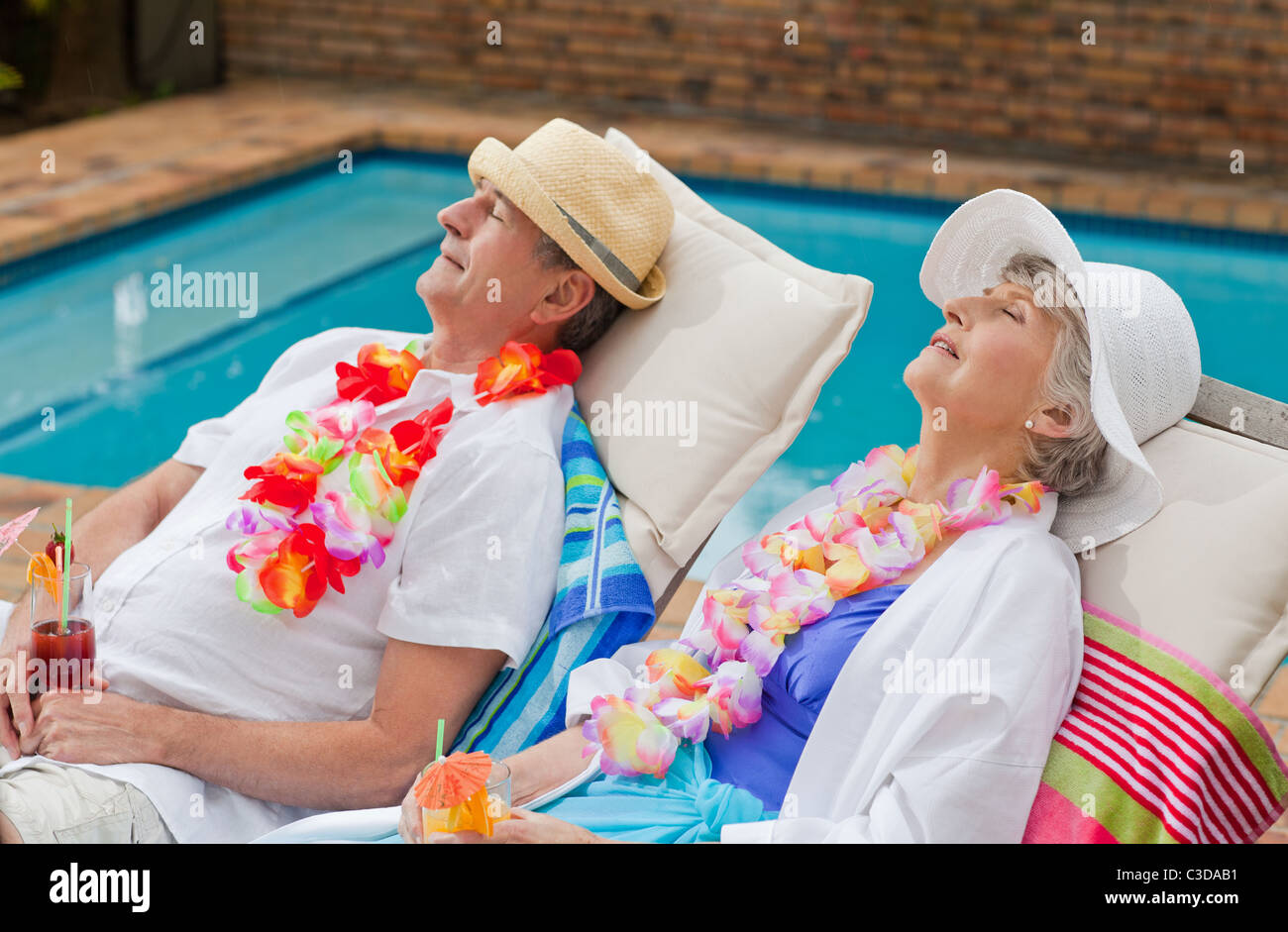 Sleeping by the pool hi-res stock photography and images - Alamy