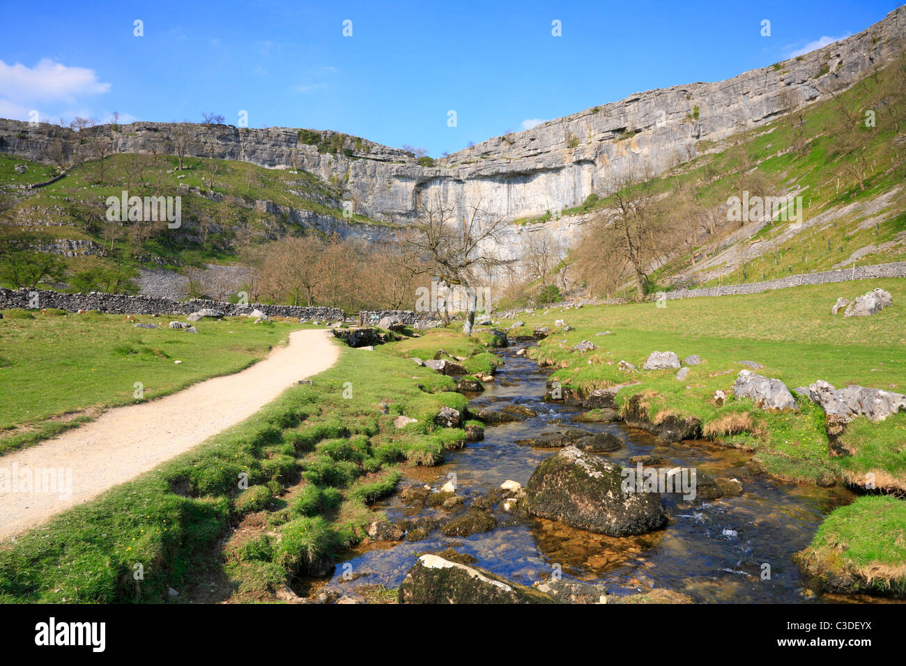 The Pennine Way alongside Malham Beck at Malham Cove, Malham, North ...