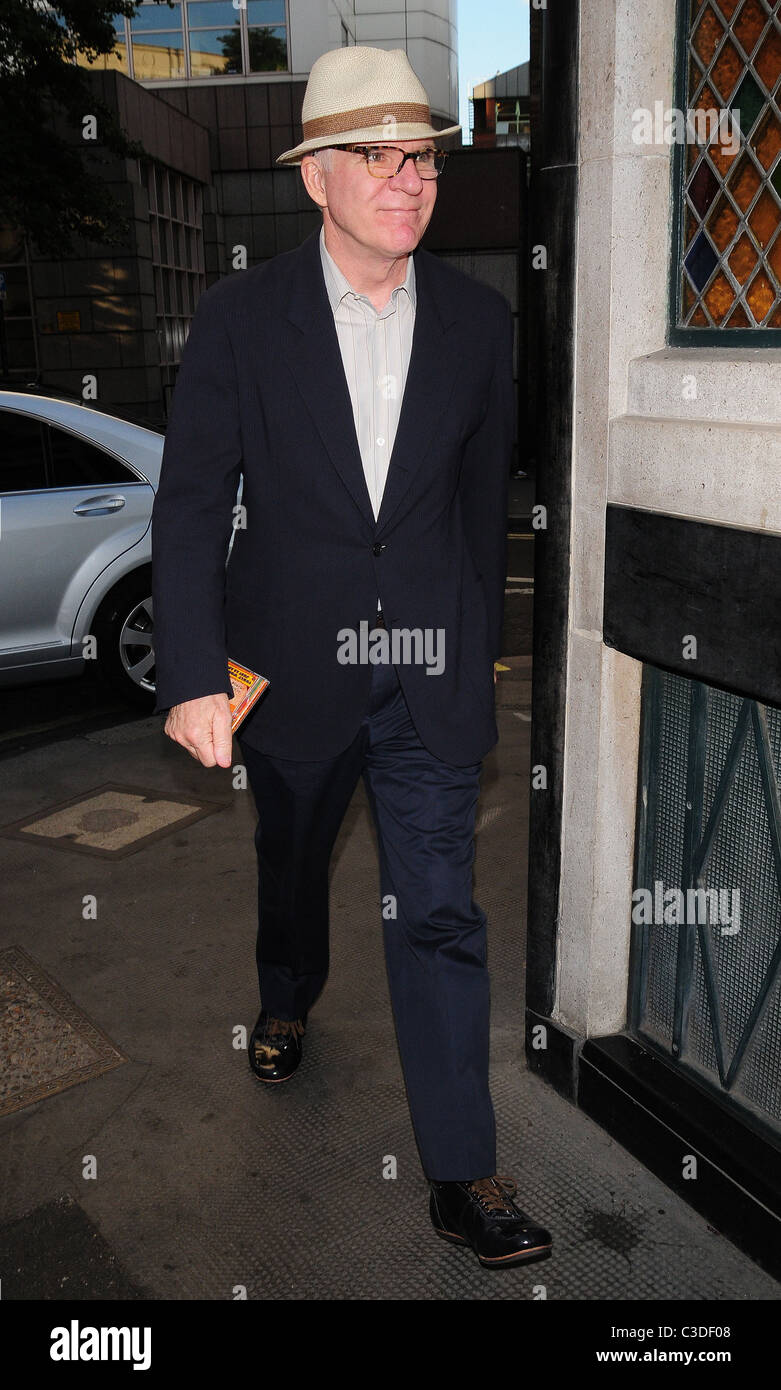 Steve Martin outside the Ivy restaurant carrying a copy of his CD 'The ...