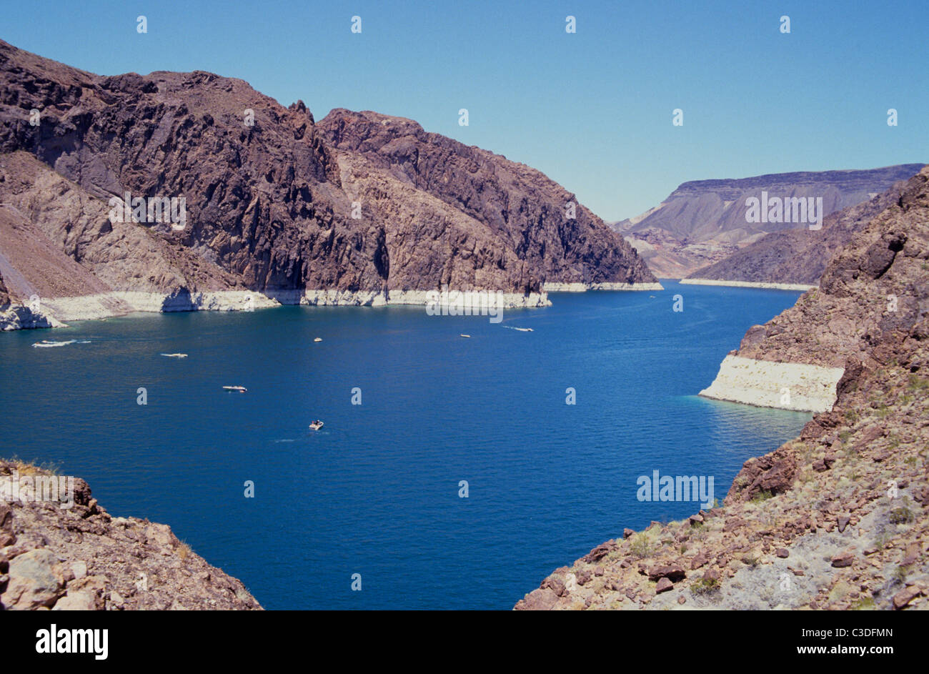 Hoover dam water behind the dam at a lower level. Hoover Dam is a ...