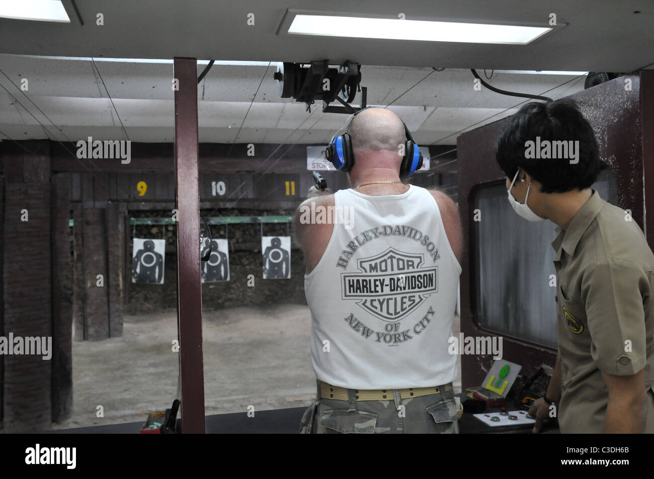 Firing of a colt 45 on the range Stock Photo - Alamy