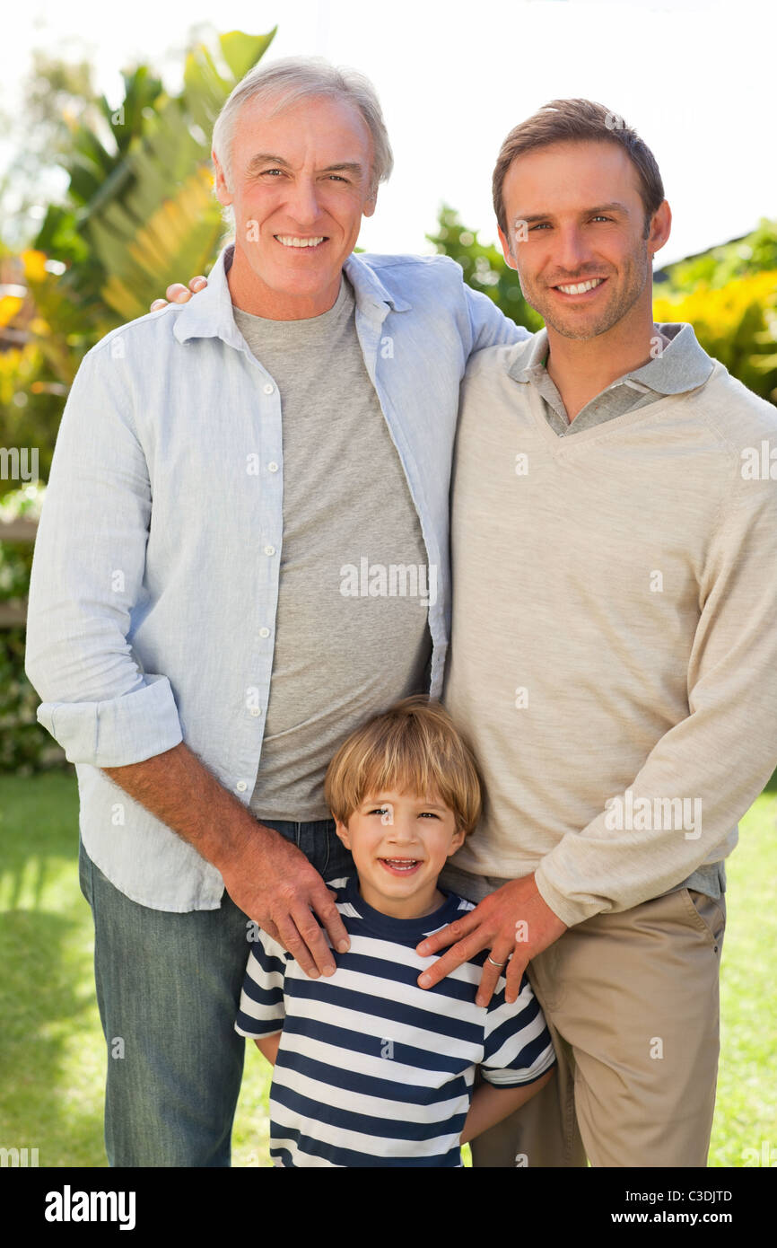 Portrait of a family looking at the camera Stock Photo - Alamy