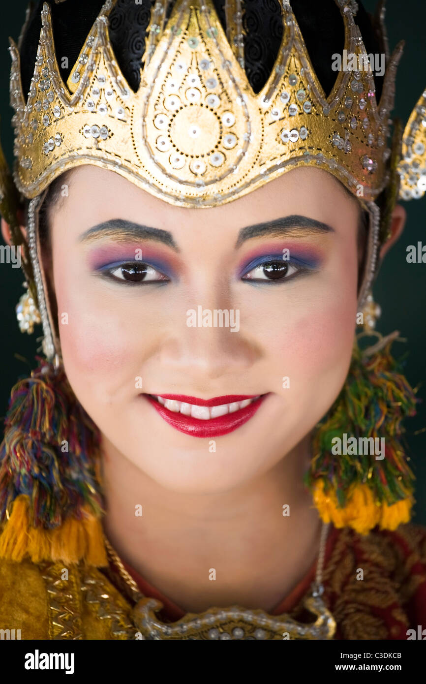 A young javanese dancer in traditional costume at the kings summer ...
