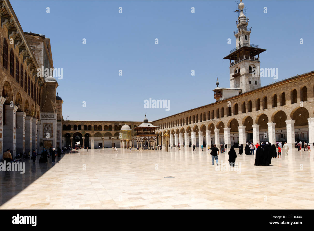 Tower of the Bride minaret stands tall over the great colonnaded white ...