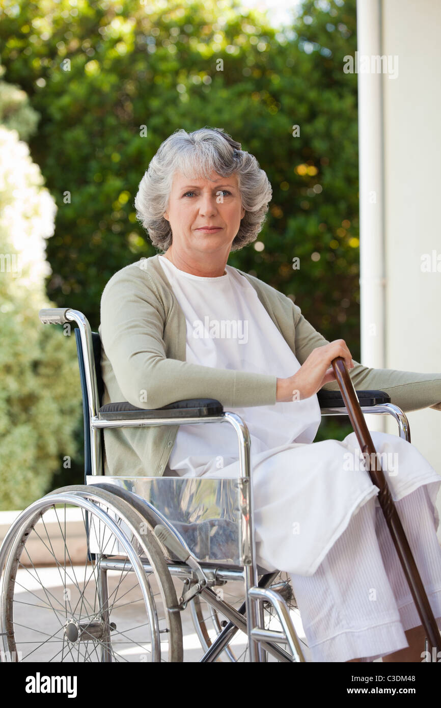 Senior woman in her wheelchair Stock Photo - Alamy