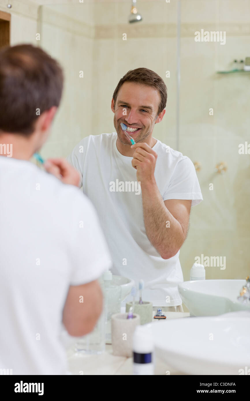 Man brushing his teeth Stock Photo - Alamy