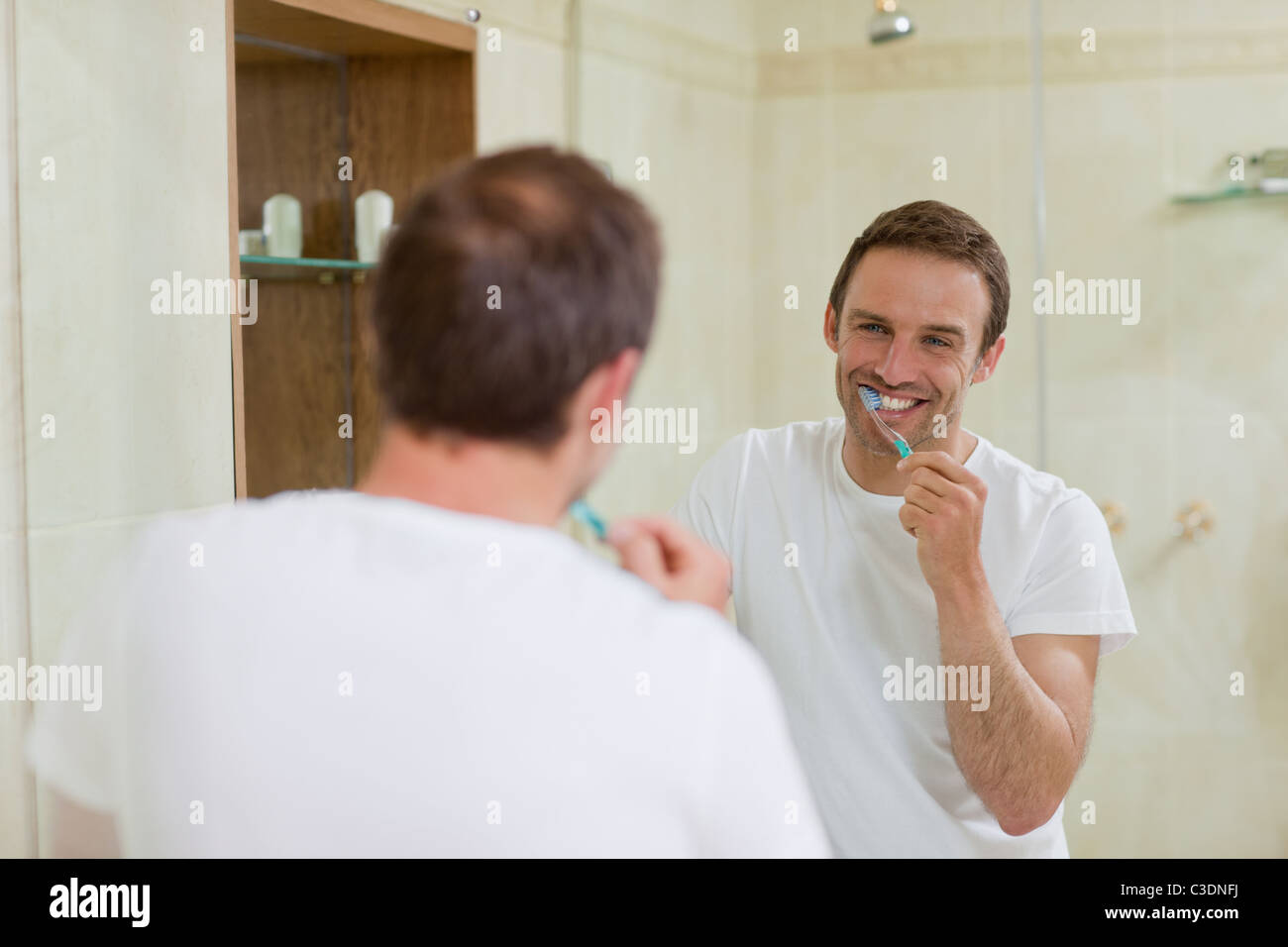 Man brushing his teeth Stock Photo - Alamy