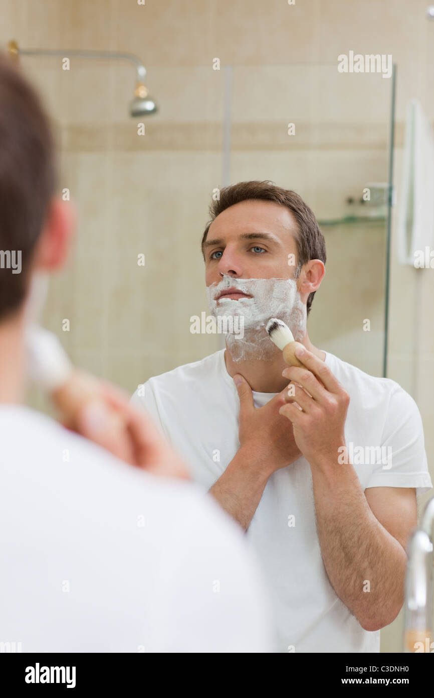 Man shaving in the bathroom Stock Photo - Alamy