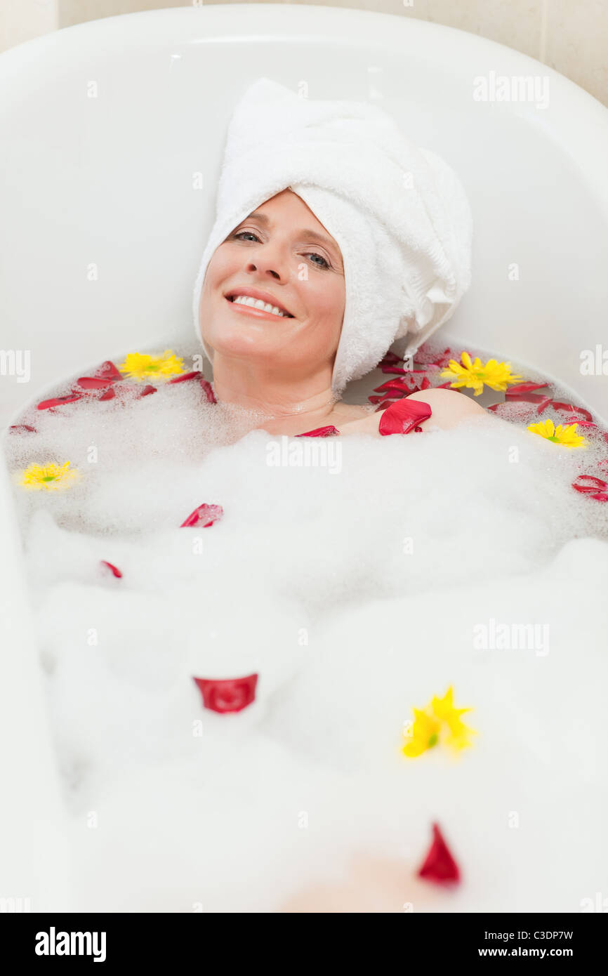Relaxed woman taking a relaxing bath Stock Photo - Alamy