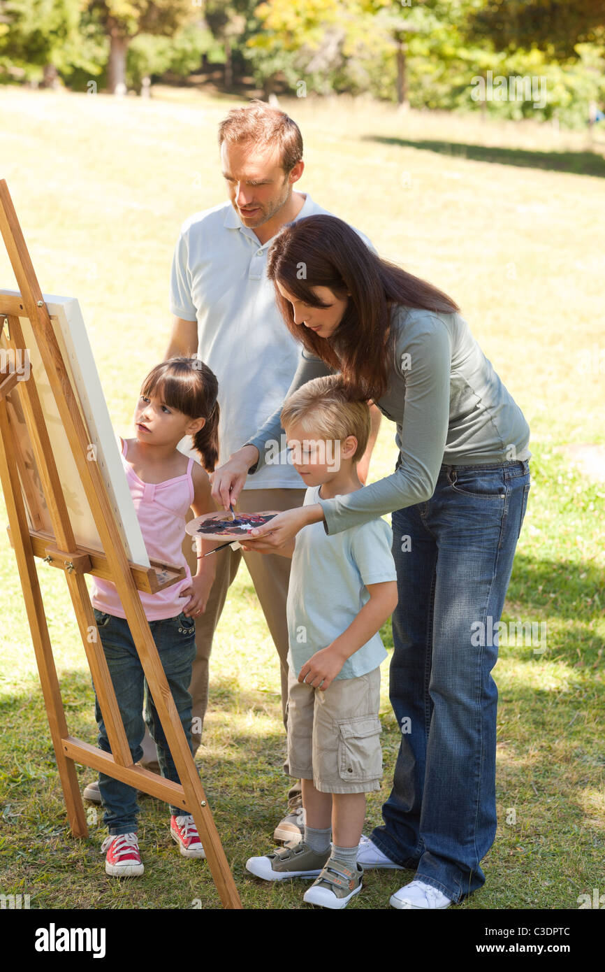 Family painting together in the park Stock Photo - Alamy