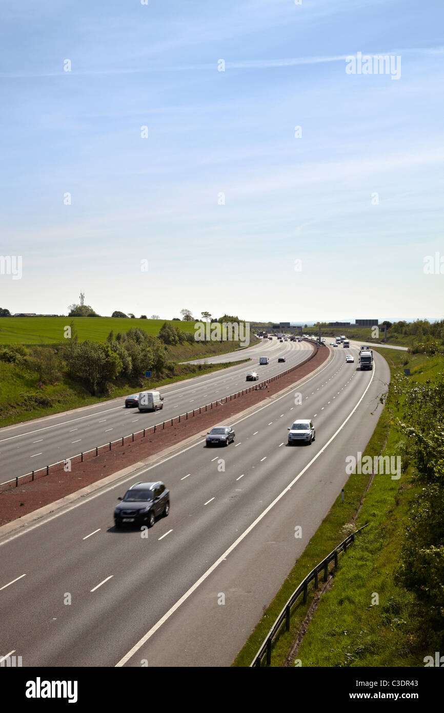 M1 Motorway England. Shot on bright sunny day with blue sky. Showing ...