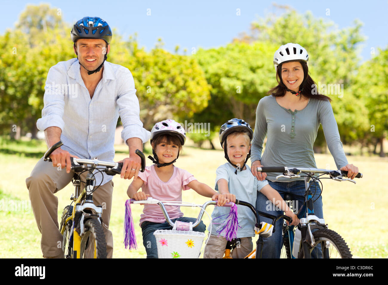 Family with their bikes Stock Photo - Alamy