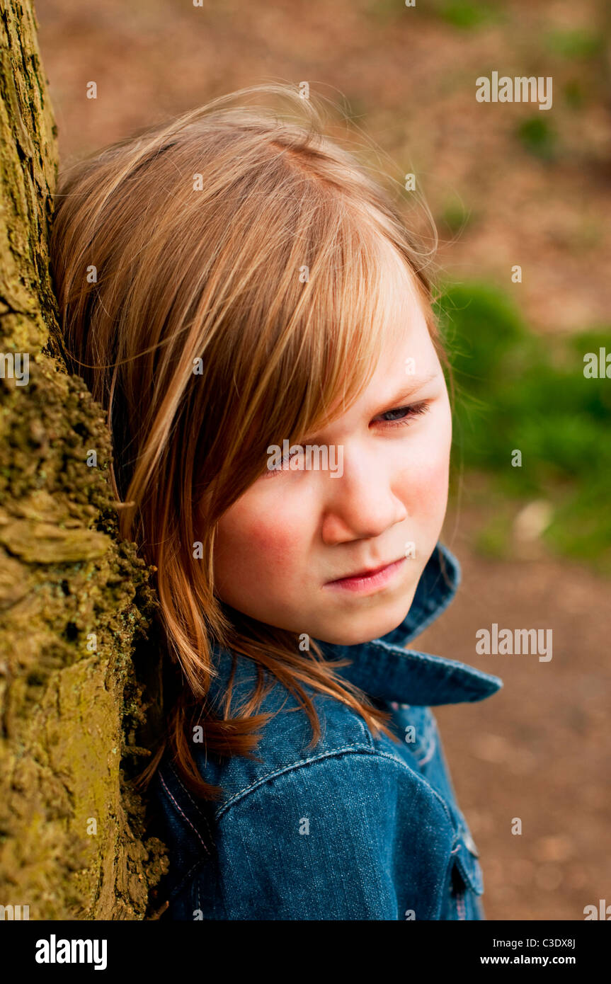 Scared girl hiding face hi-res stock photography and images - Alamy