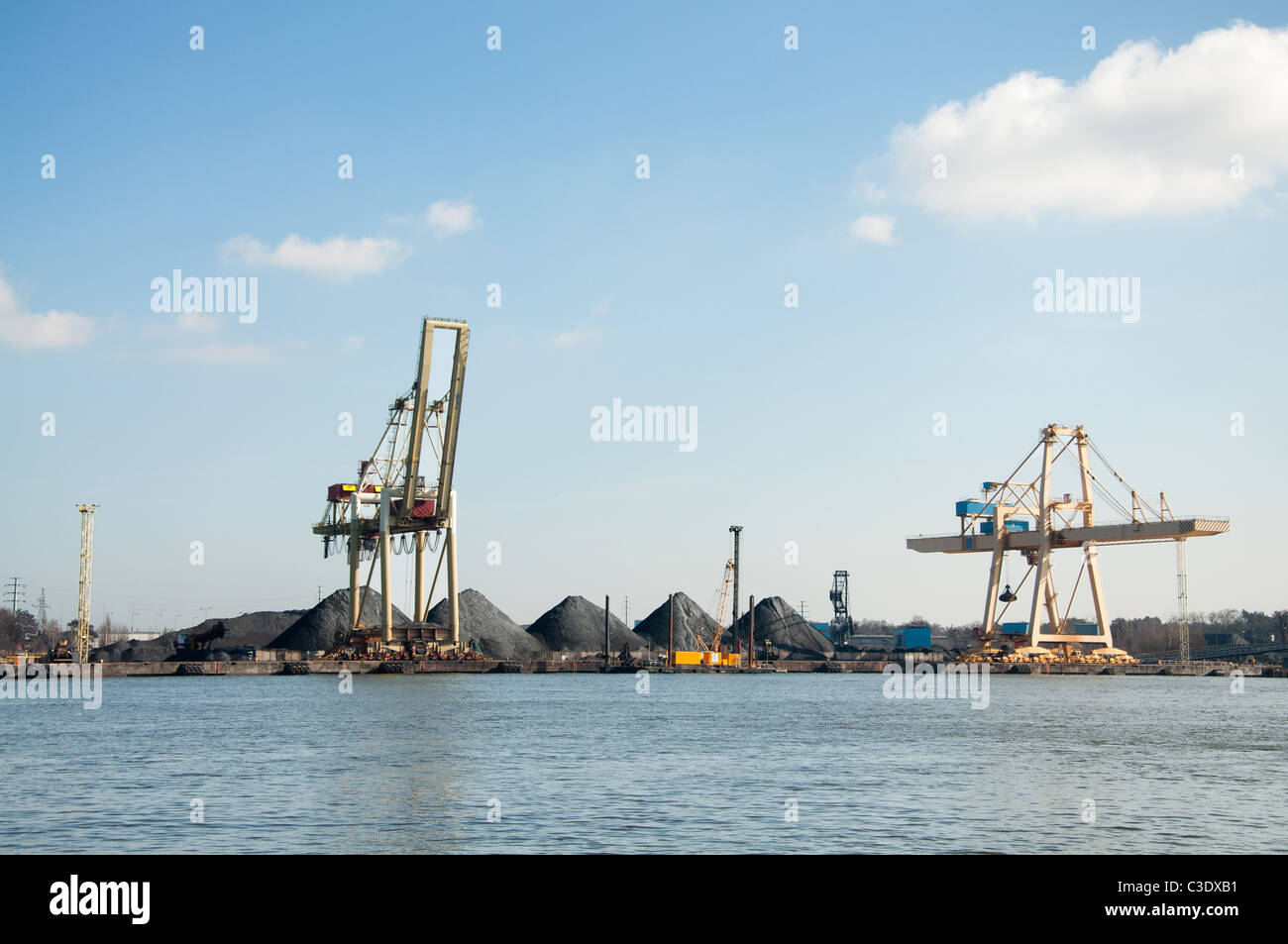 slag heaps of coal on the wharf in the port Stock Photo - Alamy
