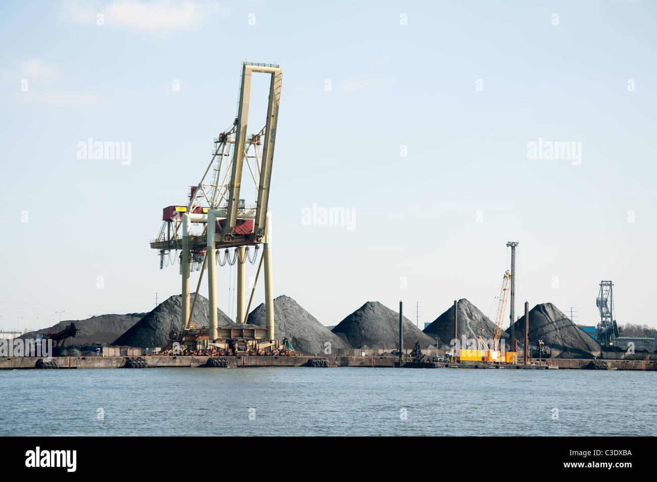 slag heaps of coal on the wharf in the port Stock Photo - Alamy