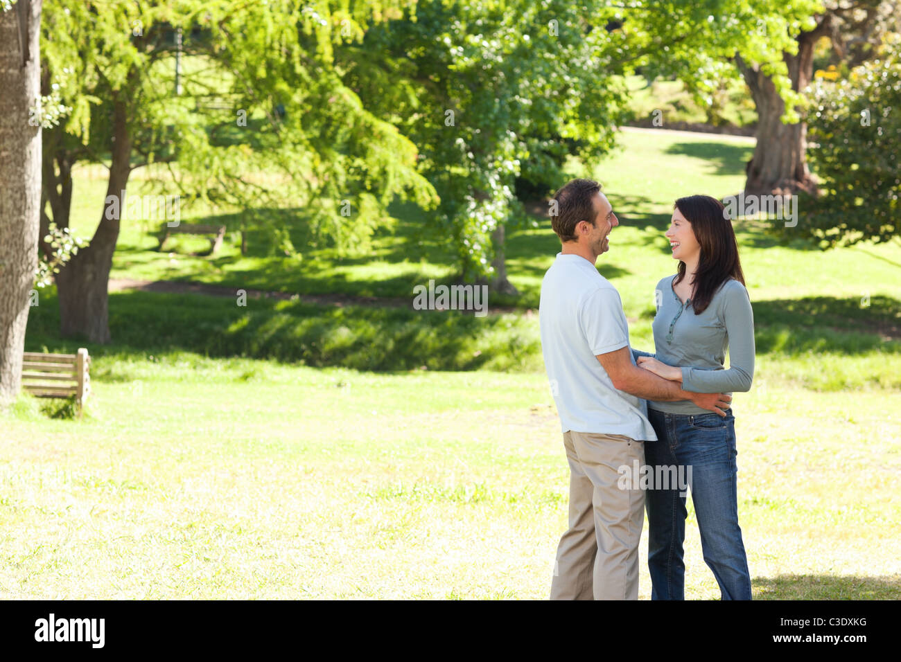 Beautiful lovers in the park Stock Photo - Alamy