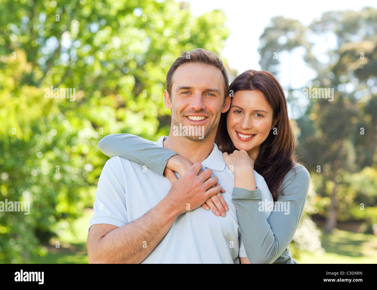 Beautiful couple in the park Stock Photo - Alamy
