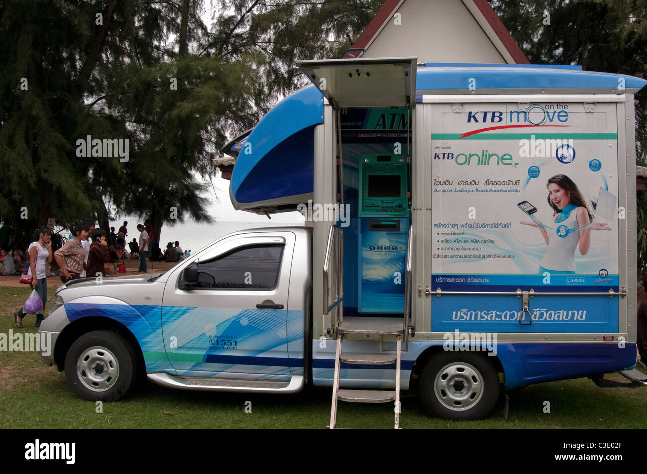 Mobile ATM or cash point machine parked at a popular beach outside ...