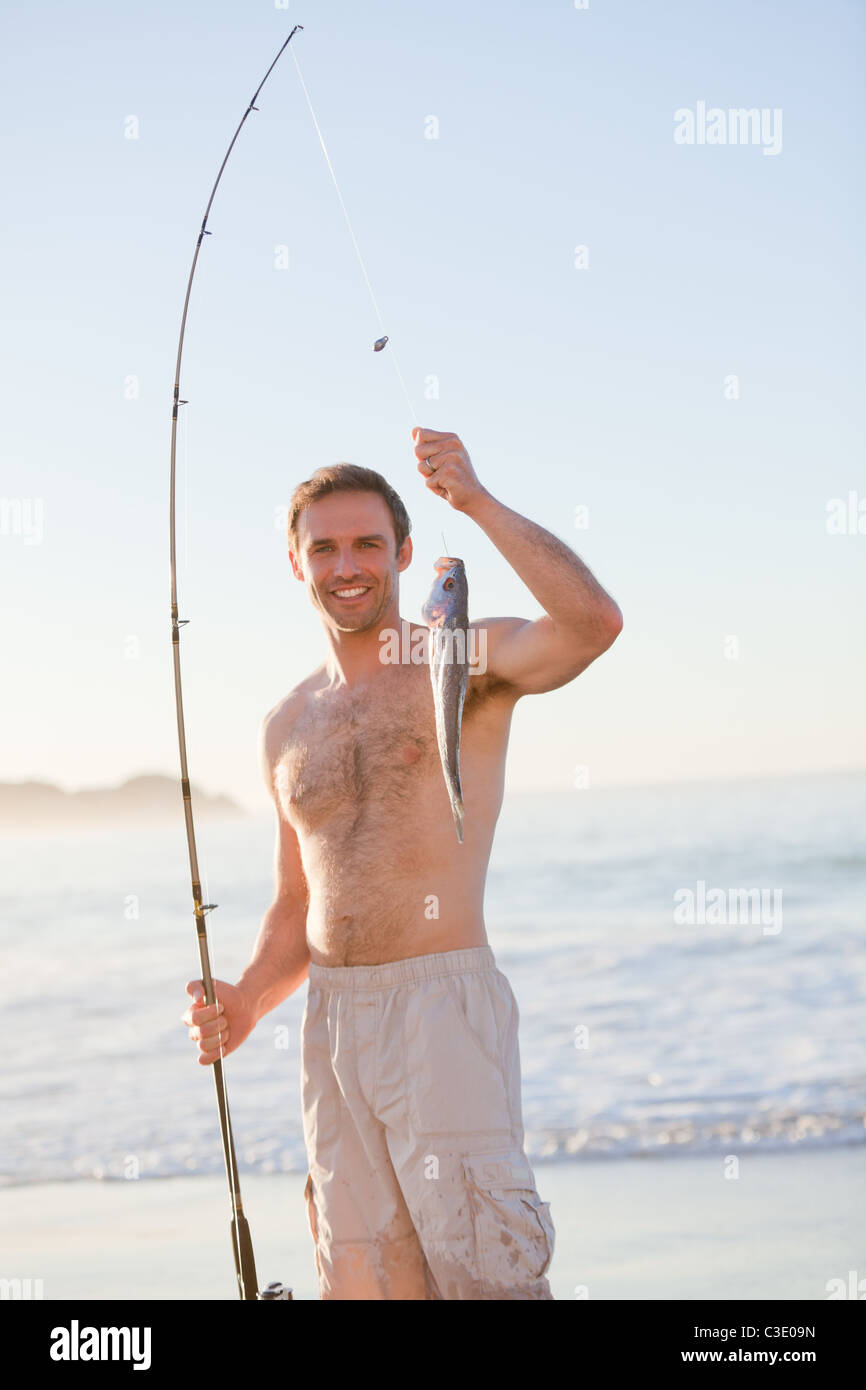 Active man fishing Stock Photo - Alamy