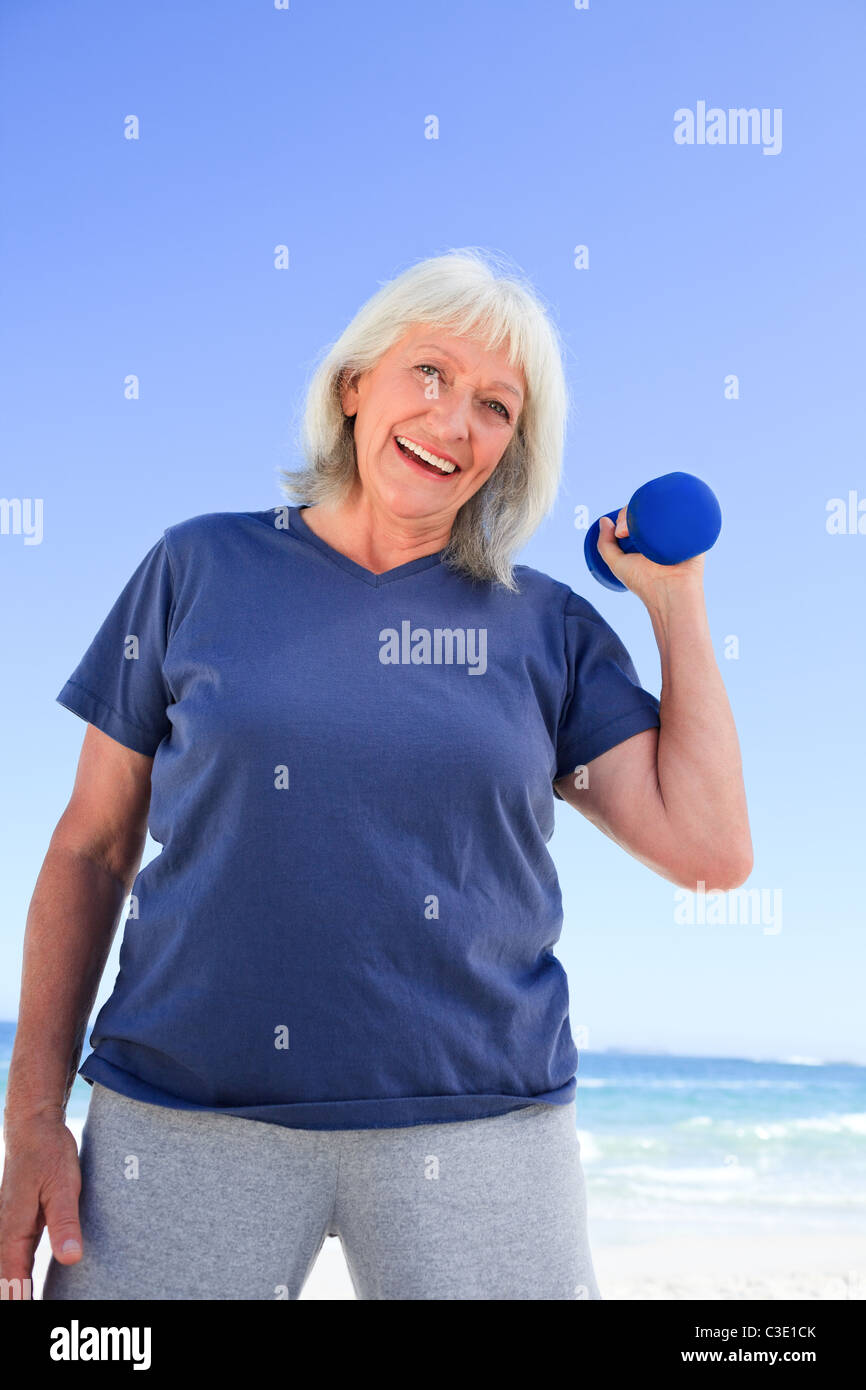 Mature woman doing her exercises Stock Photo - Alamy