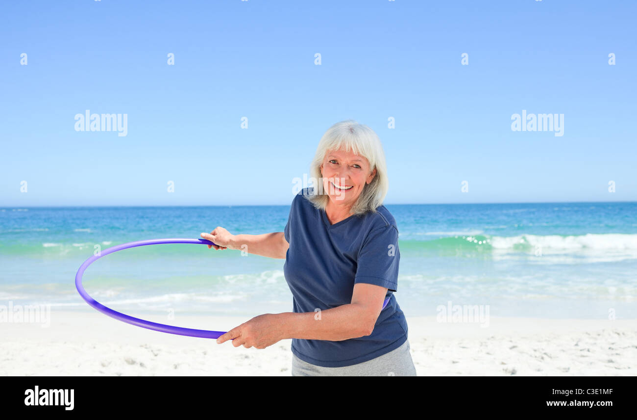 Hula hoop mature woman hi-res stock photography and images - Alamy