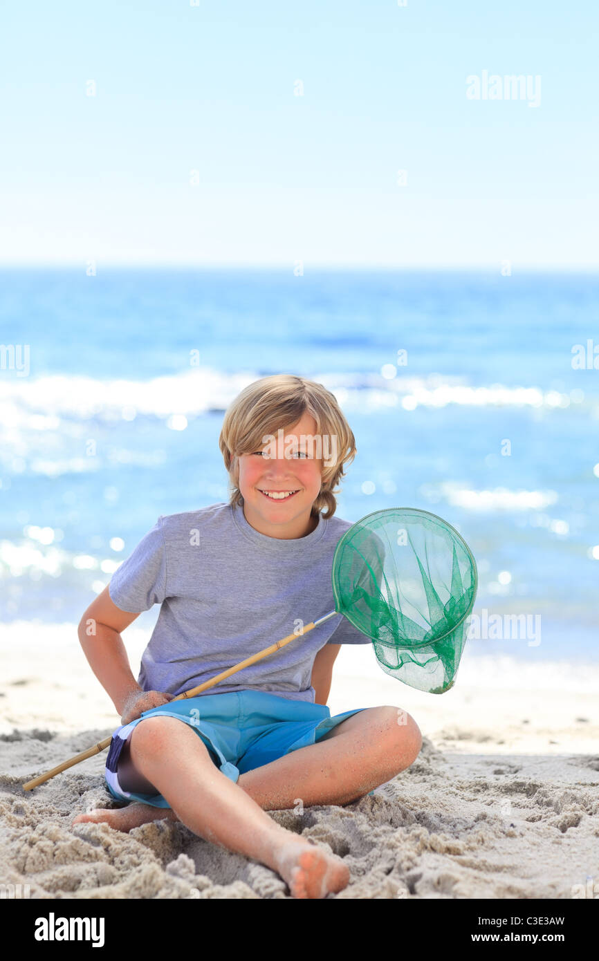 Nets by hand sea shore hi-res stock photography and images - Alamy