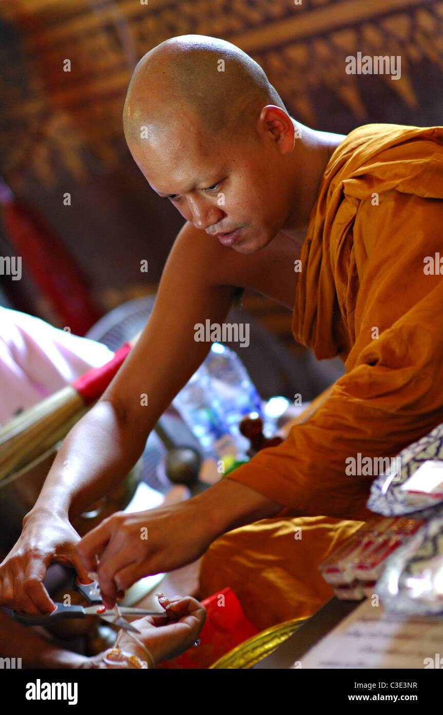 Monk praying in Temple Stock Photo - Alamy